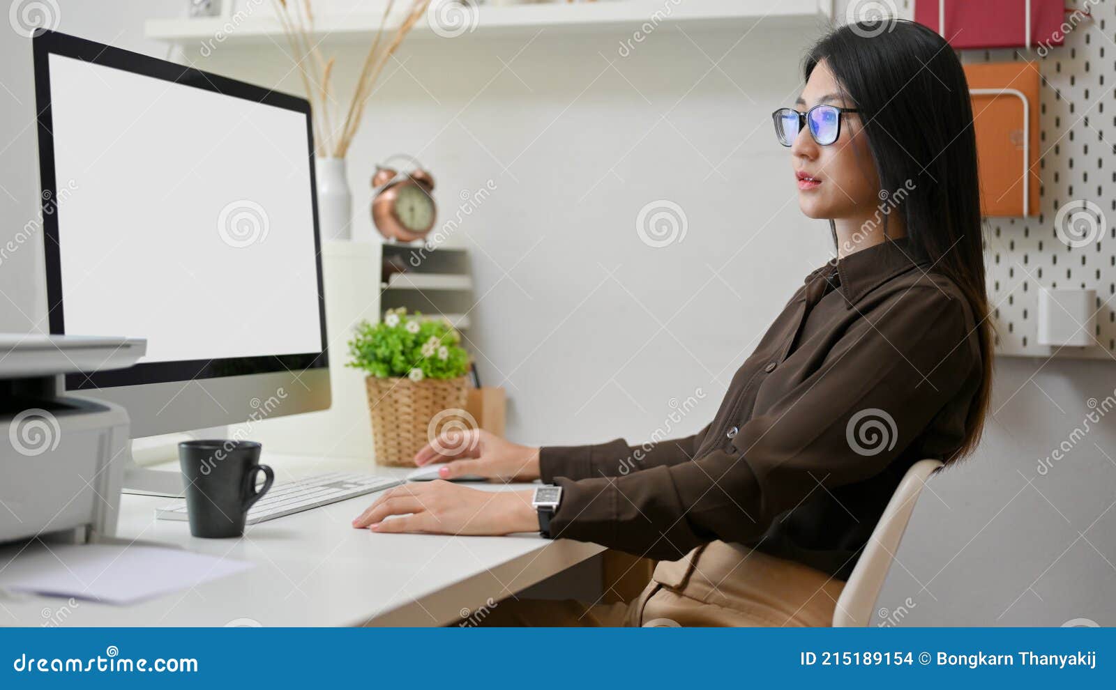 Female Office Worker Concentrate on Her Work with Computer Device in ...