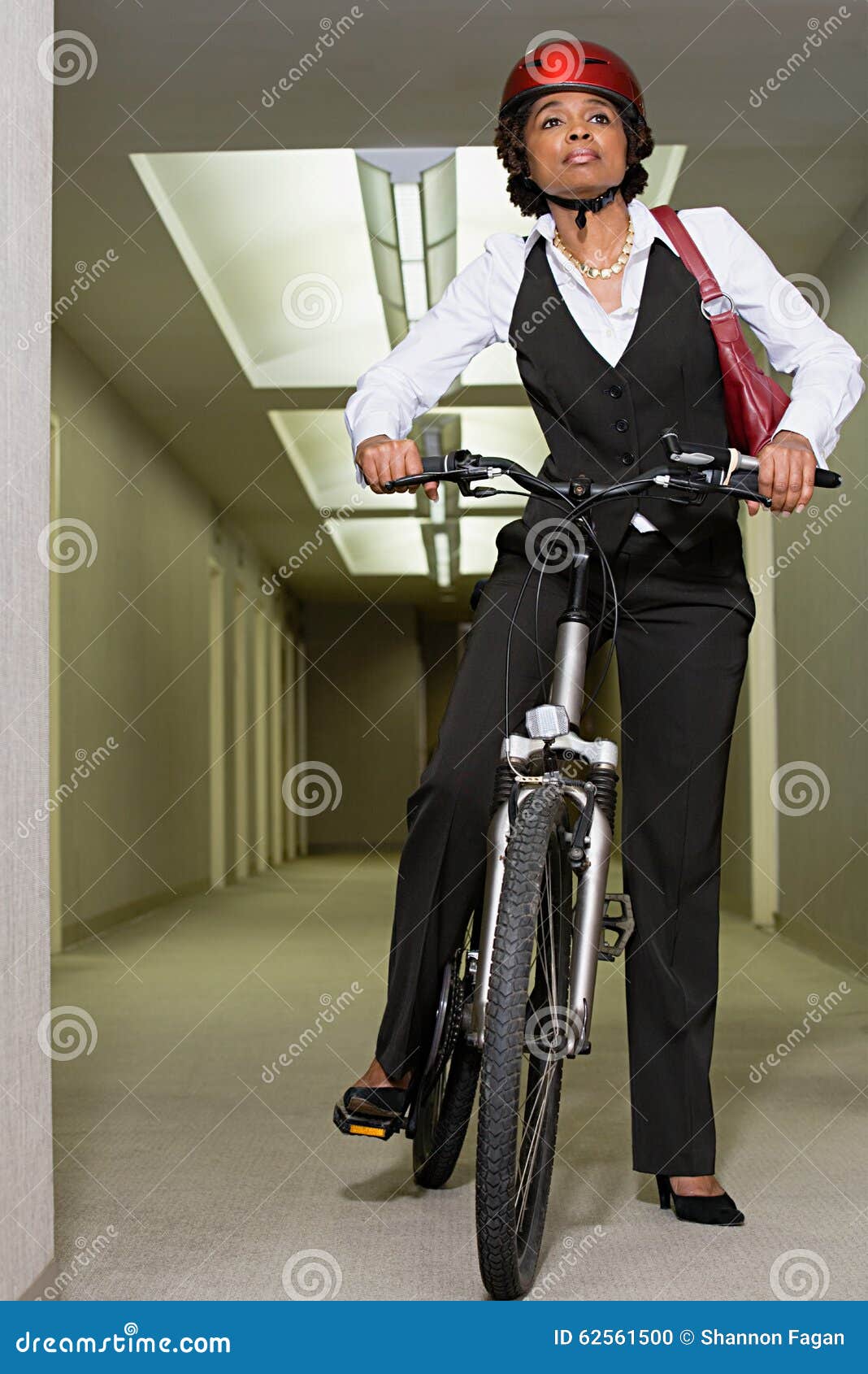 Female Office Worker on a Mountain Bike Stock Photo - Image of friendly ...