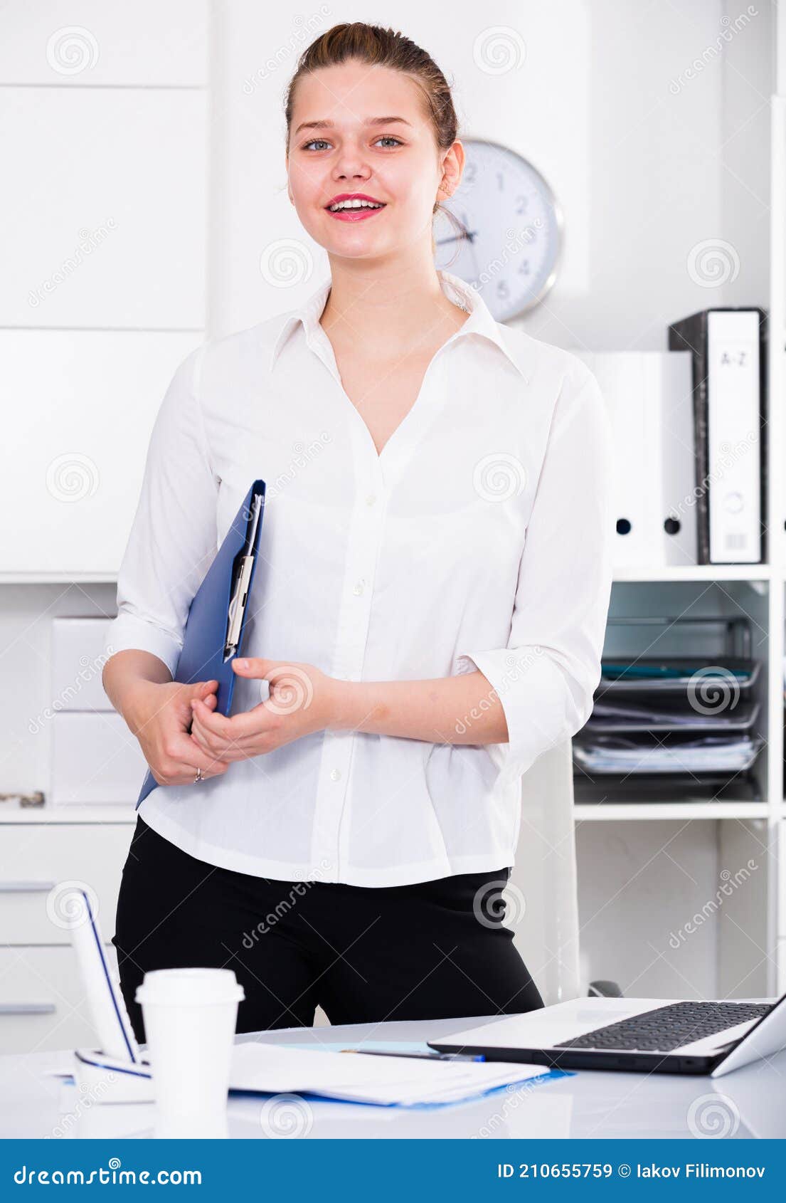 Female Office Worker is Standing with Documents Stock Image - Image of ...