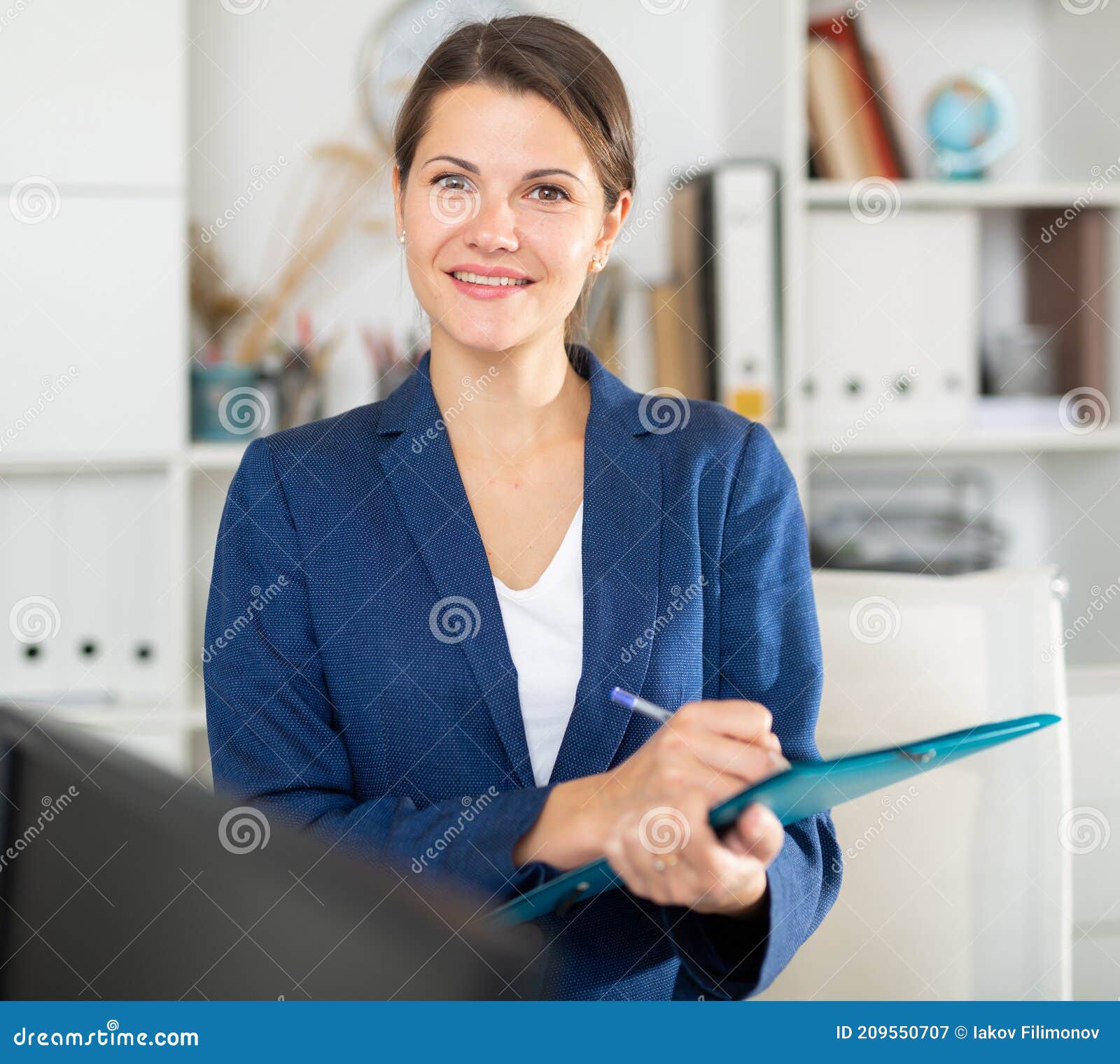 Female Office Worker is Standing with Documents before Signing Stock ...