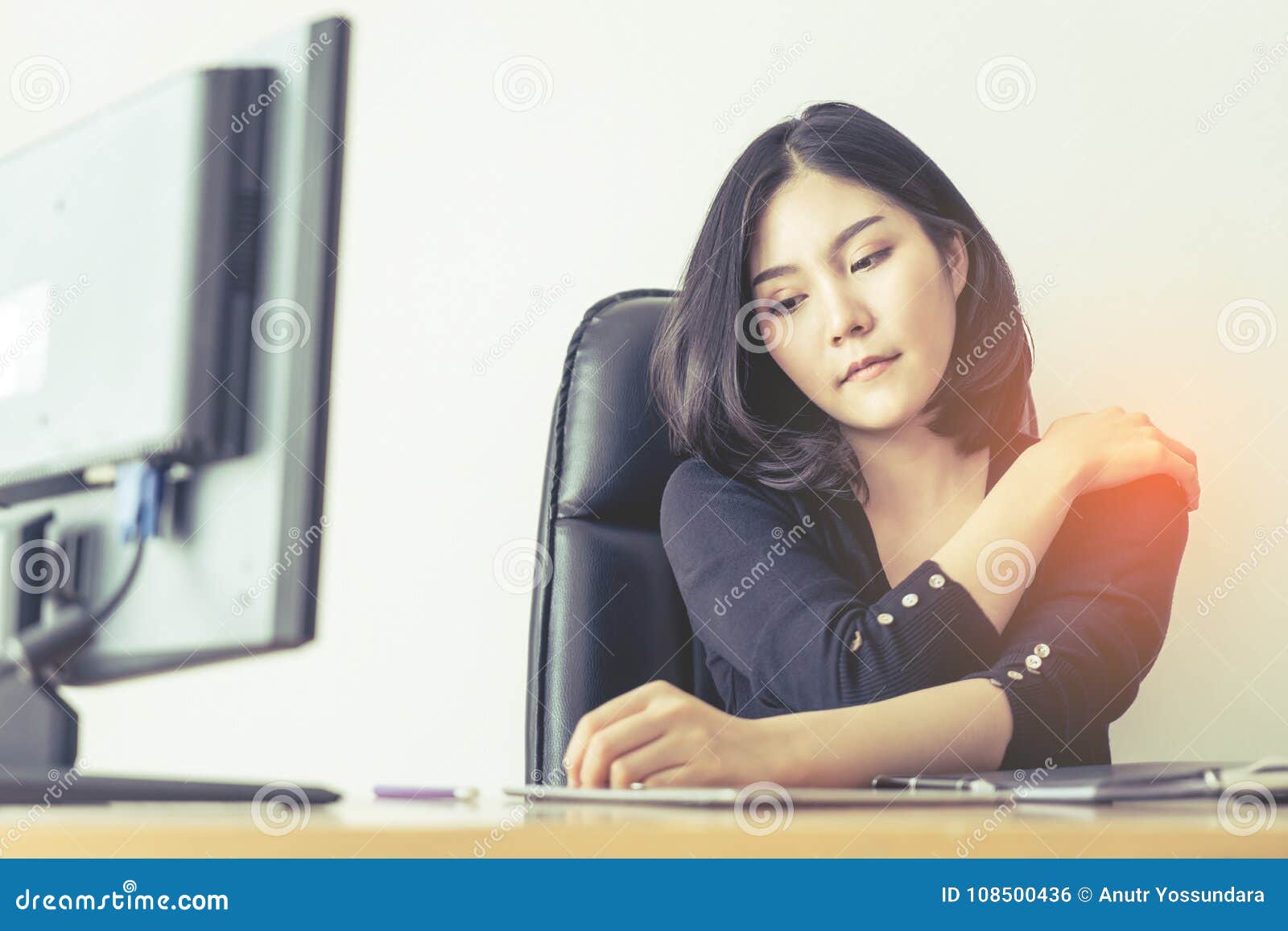 Female Office Worker Suffering Injury on Shoulder from Long Hour of ...