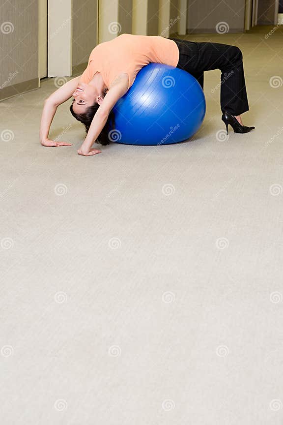 Female Office Worker Using an Exercise Ball Stock Image - Image of ...