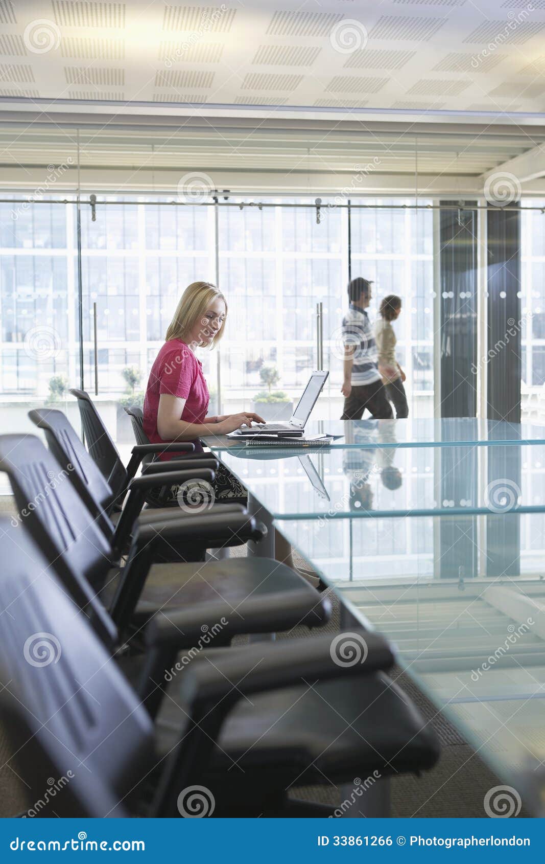 Female Office Worker Using Laptop in Conference Room Stock Photo ...