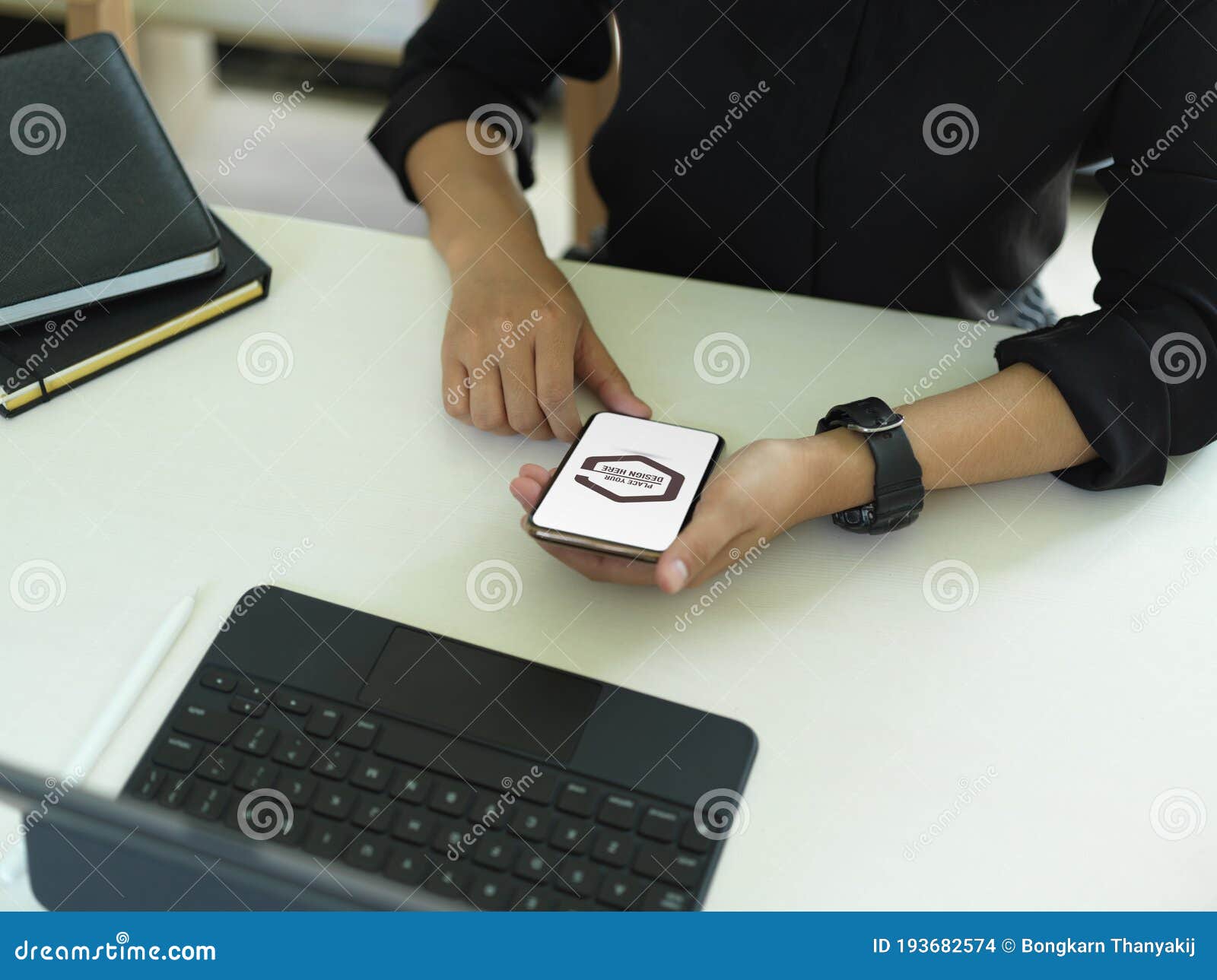 Female Office Worker Using Mock Up Smartphone on Work Table Stock Photo ...