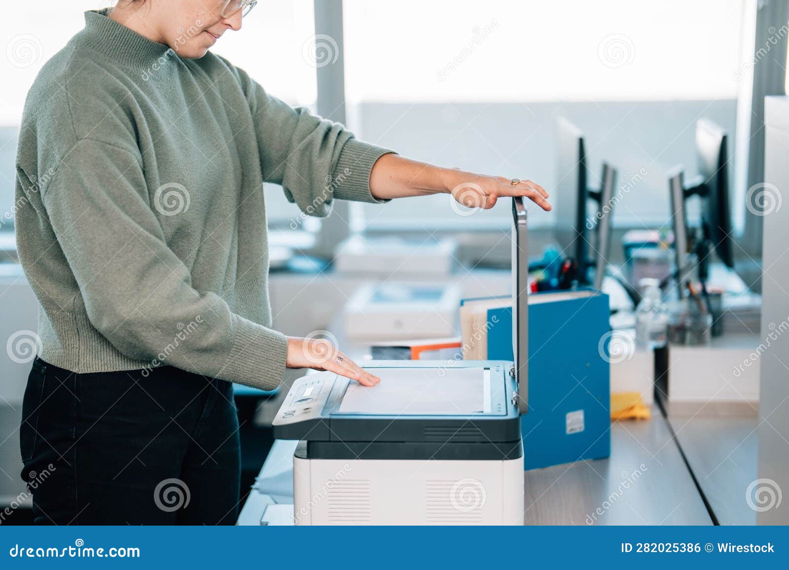 Female Office Worker Using the Printer at the Office Stock Photo ...