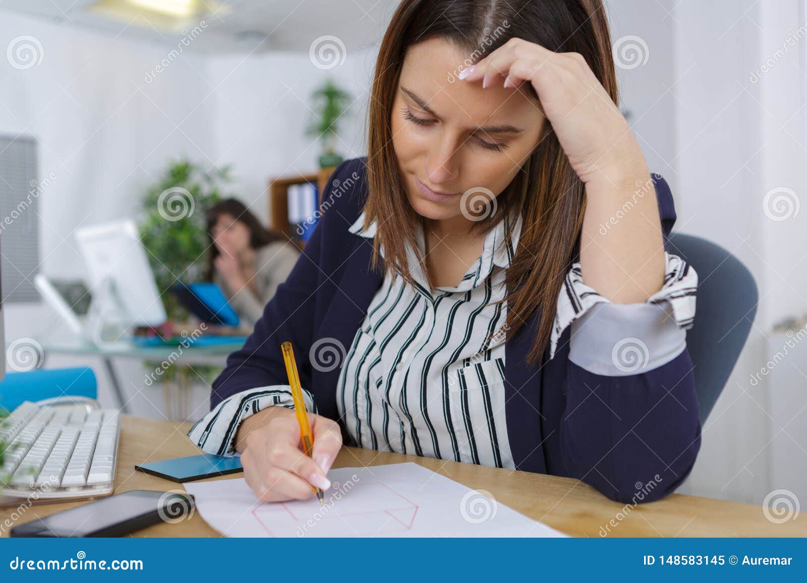 Female Office Worker Writing Something on Paper Stock Image - Image of ...
