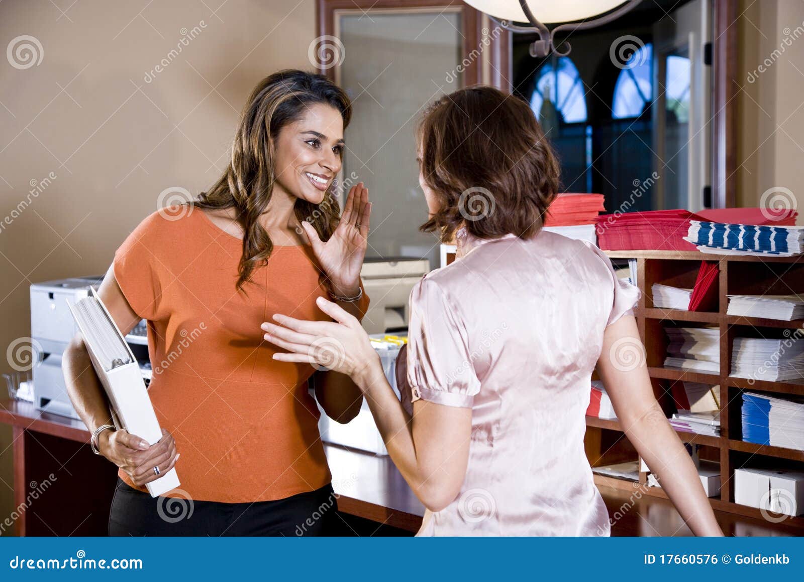 Female Office Workers Chatting in Copy Room Stock Photo - Image of ...