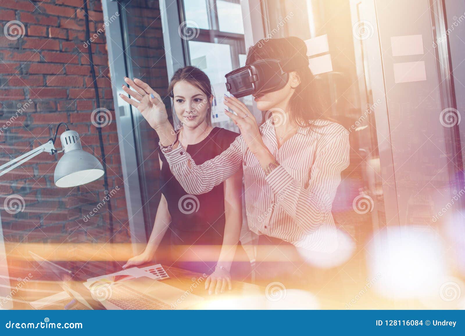 Female Office Workers Having Fun at Work Watching 3d Video in VR ...