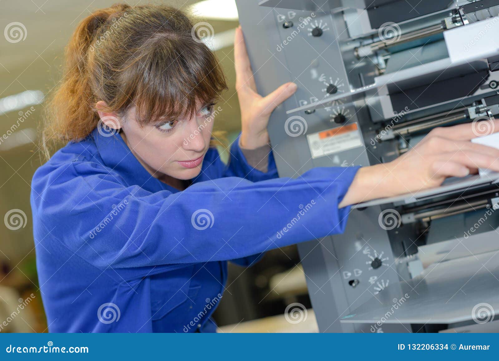 Female Operative Setting Up Machine Stock Photo - Image of metal, setup ...