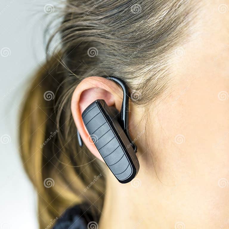 Female Operator with Bluetooth Phone Stock Image - Image of ...