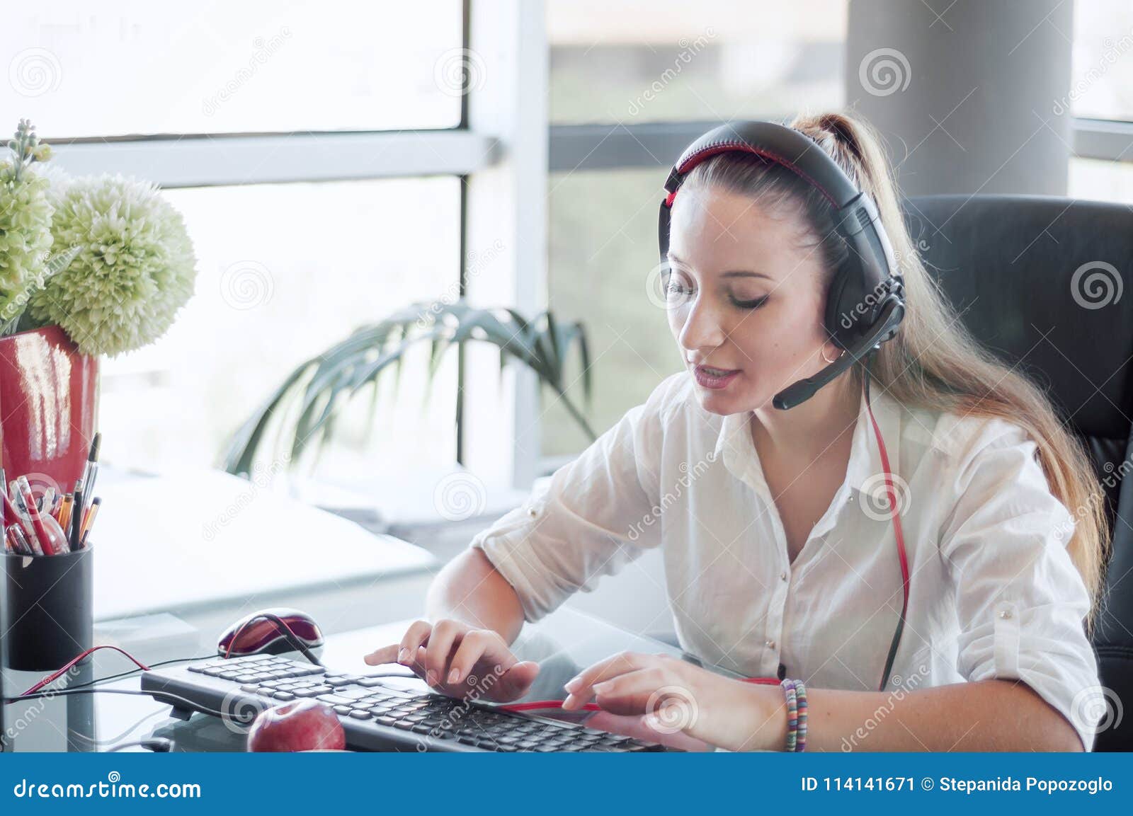 Female Operator in the Call Center, Working in Office. Stock Image ...