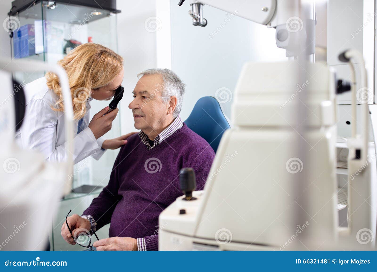 Female Ophthalmologist With Eyeglasses On Light Background Stock ...