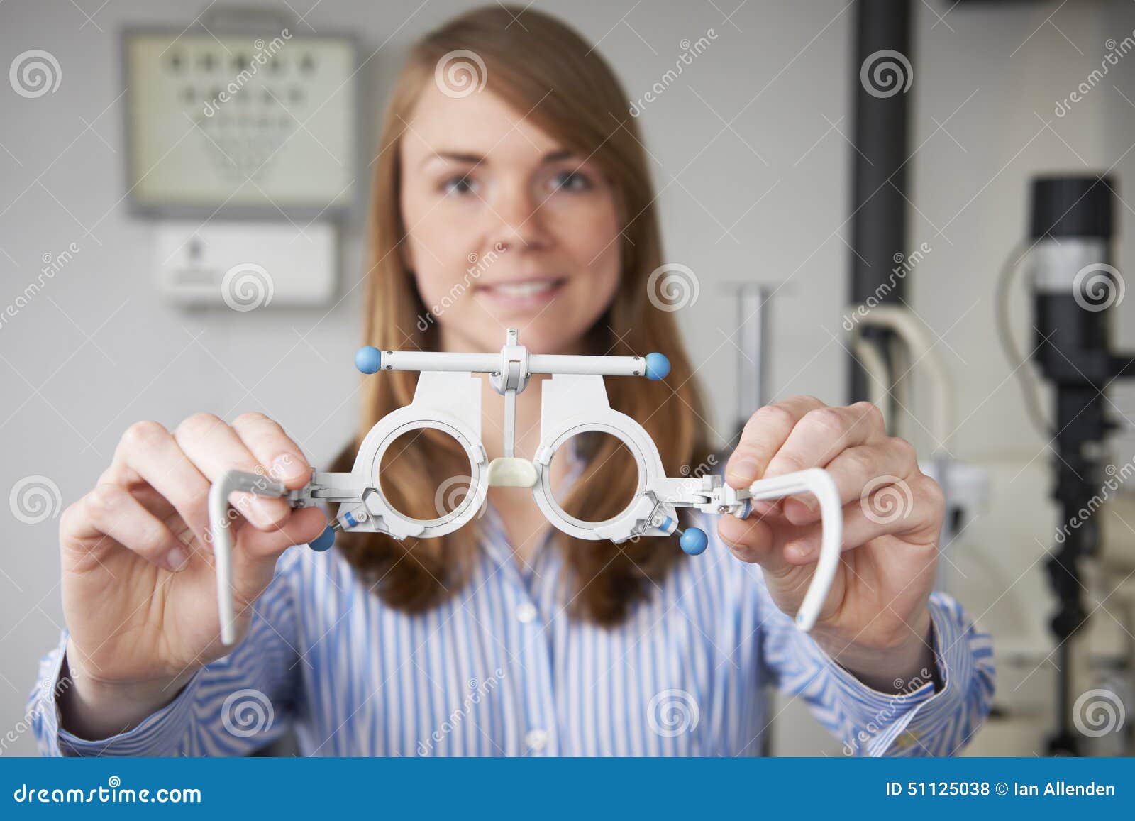 Female Optician Giving Patient Sight Test Stock Photo - Image of ...