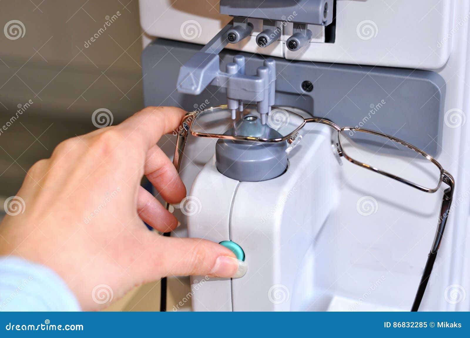 Female Optician Measuring and Preparing Glasses on the Latest Digital ...