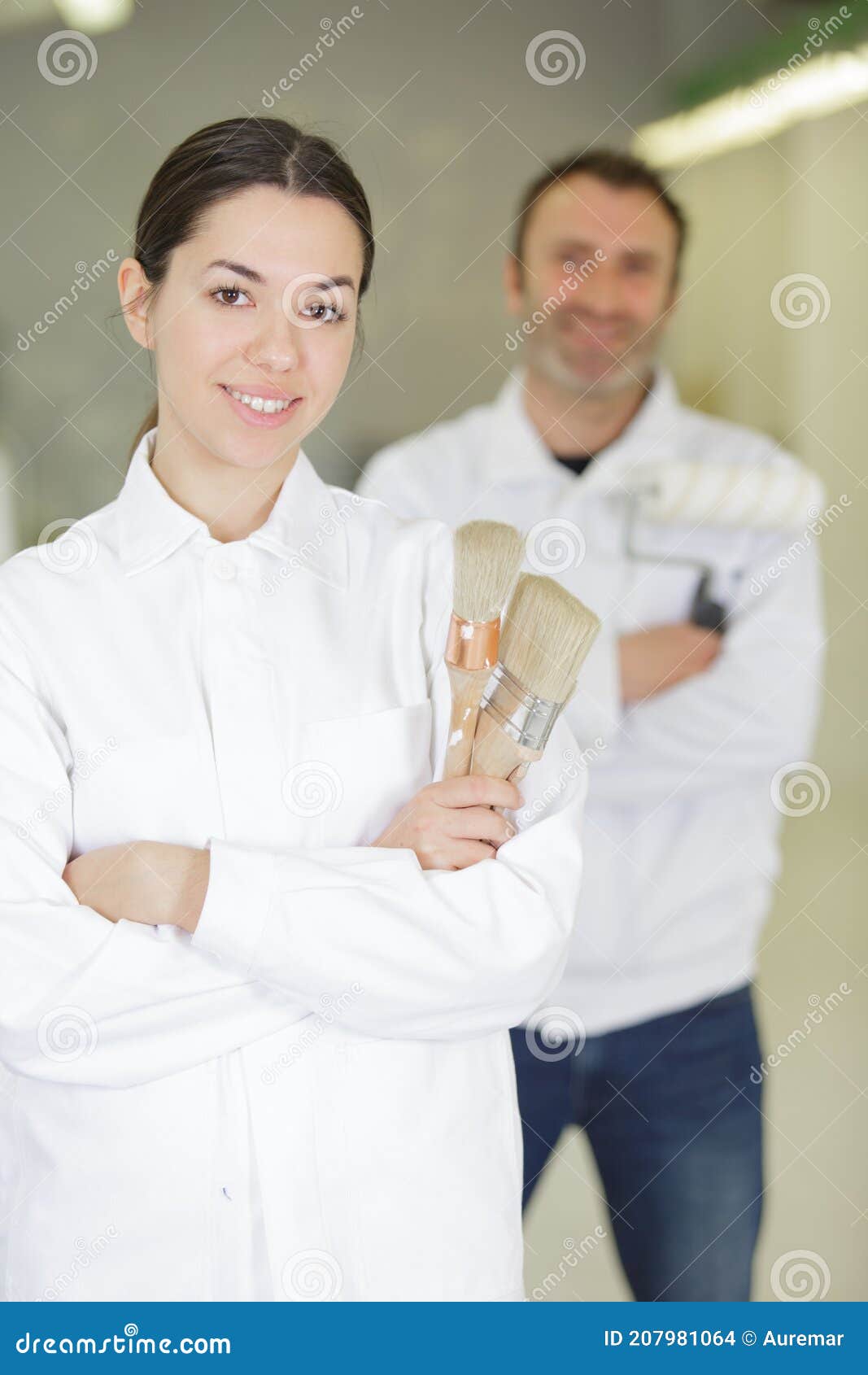 Female Painter Apprentice Looking at Camera Stock Photo - Image of ...