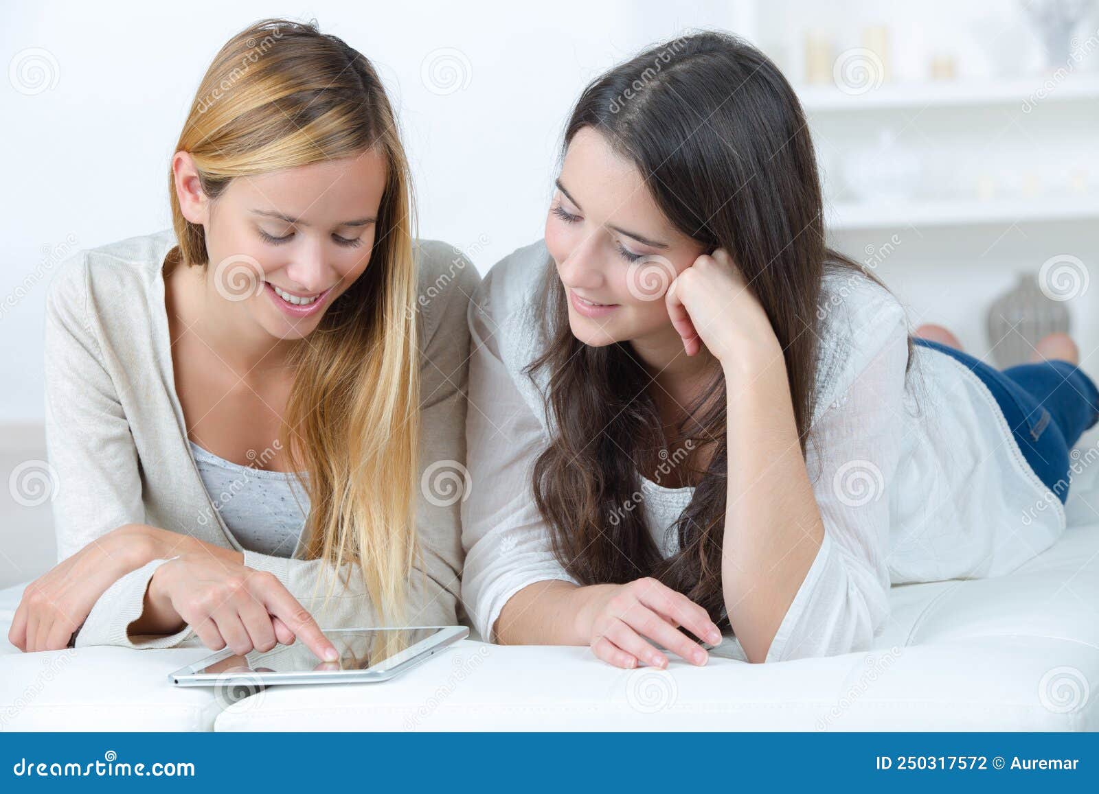 Female Pals Sharing Tablet Information Stock Photo - Image of summer ...