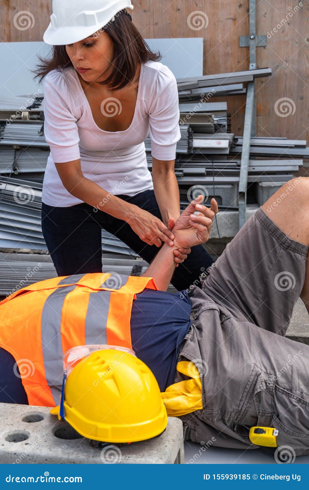 Builder injured at work stock image. Image of faint - 155939185