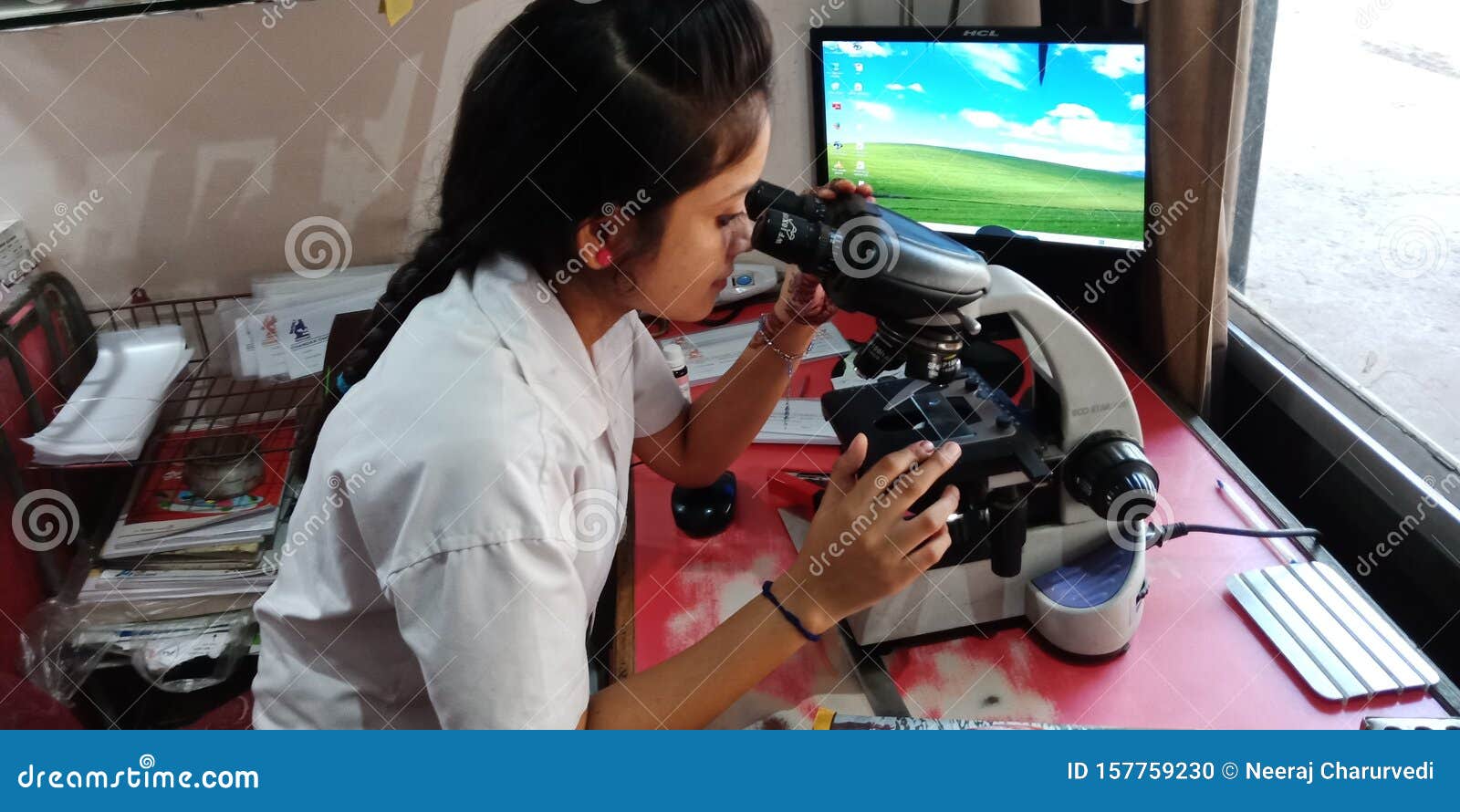 Female Pathologist Testing Samples from Horoscope at Laboratory in ...