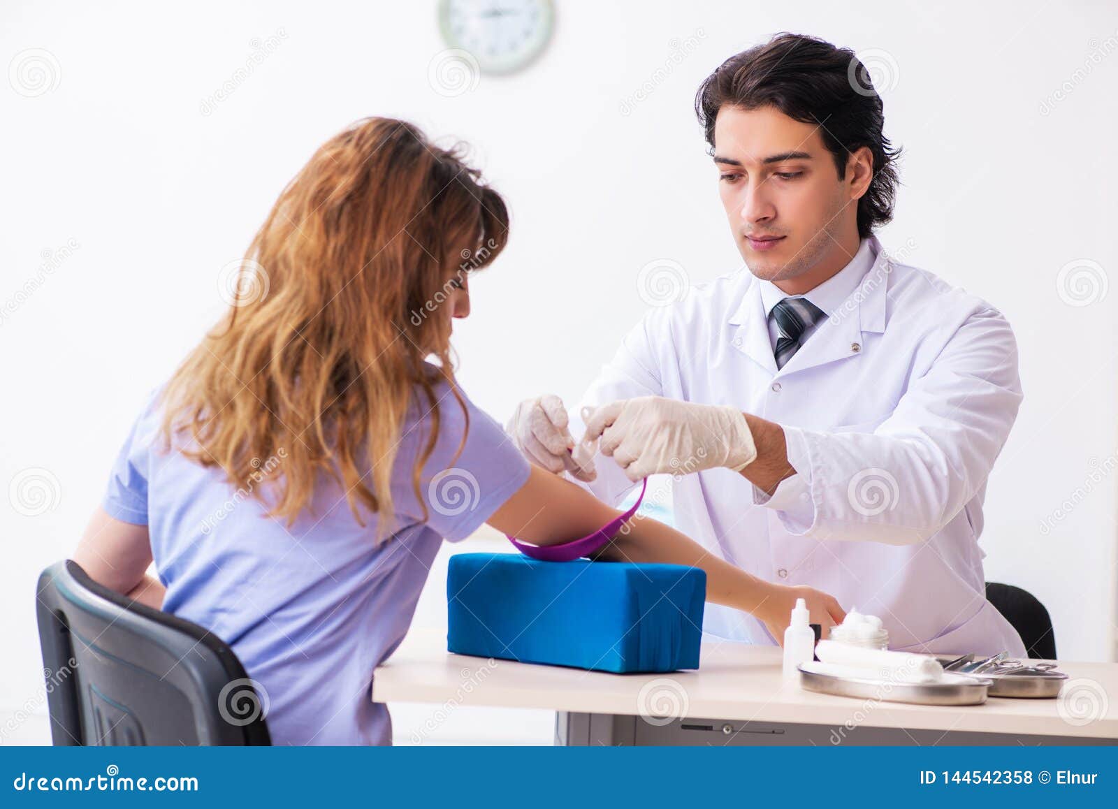 The Female Patient during Blood Test Sampling Procedure Stock Photo ...