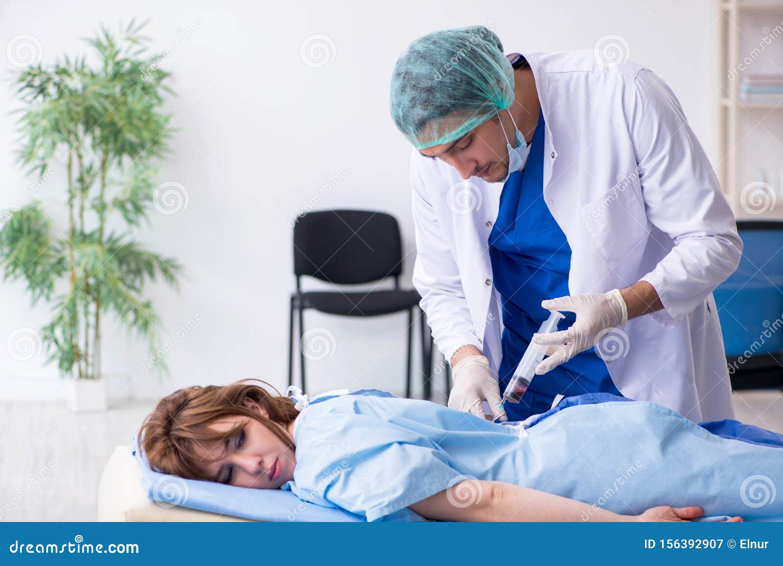Female Patient Getting an Injection in the Clinic Stock Image - Image ...
