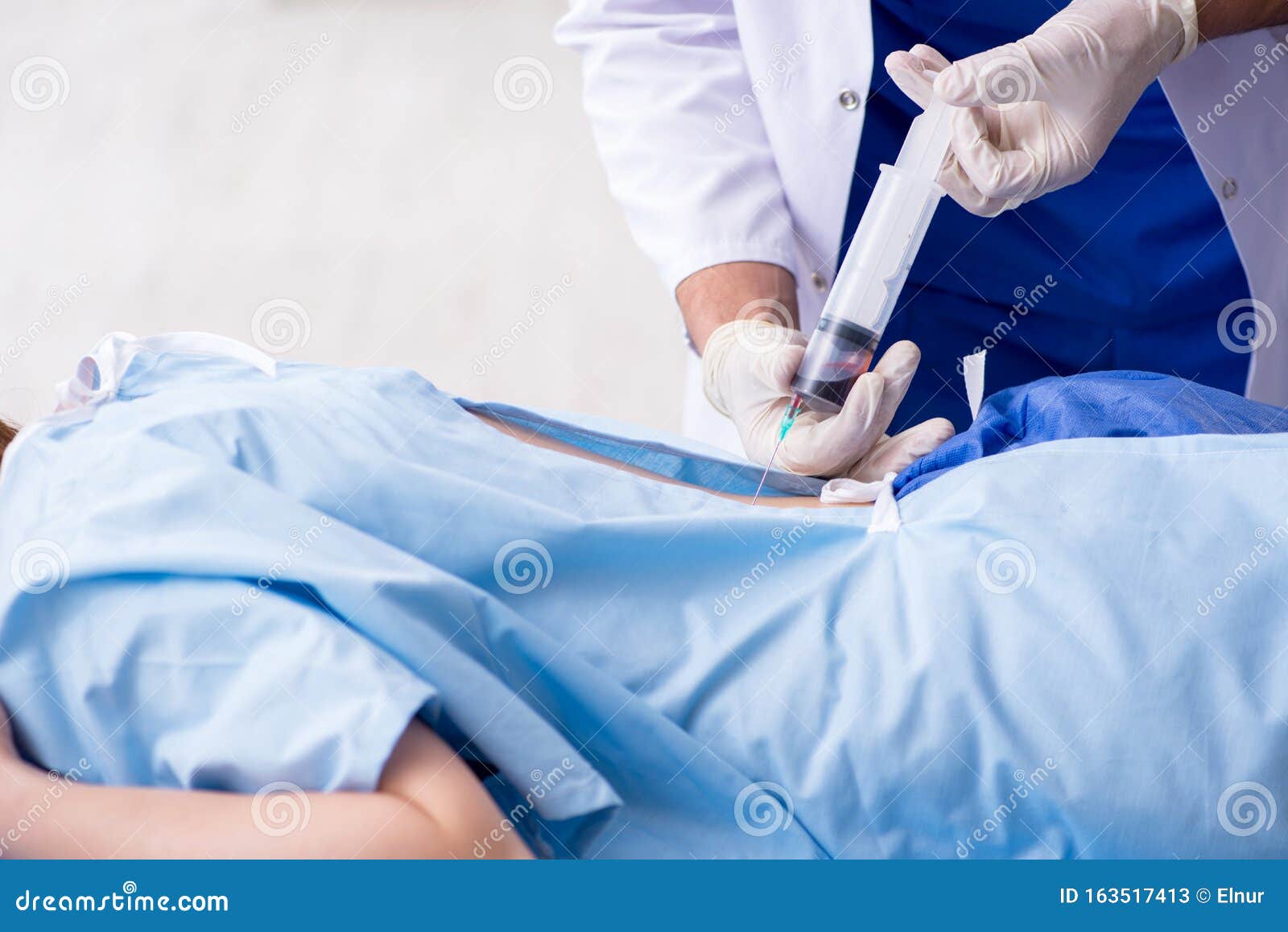 Female Patient Getting an Injection in the Clinic Stock Image - Image ...