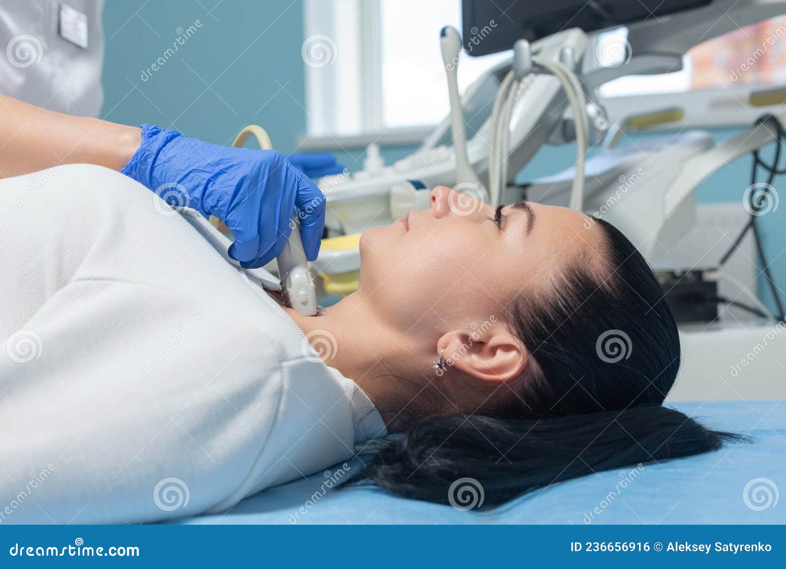 Female Patient Is Lying On A Couch During The Procedure Of Ultrasound