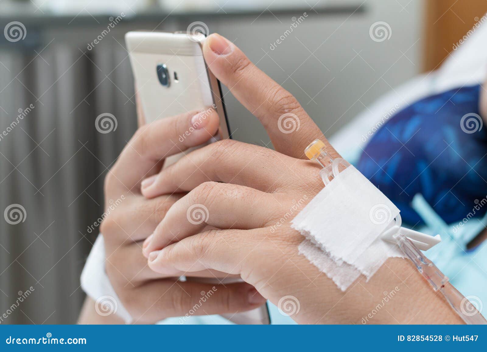 Female Patient Using Mobile Phone in Hospital Stock Photo - Image of ...