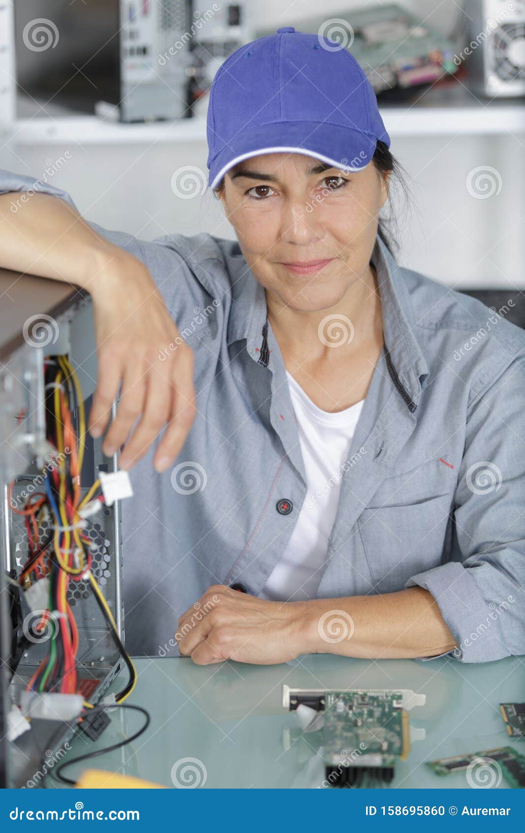 Female Pc Technician Posing by Computer Stock Photo - Image of posing, desktop: 158695860