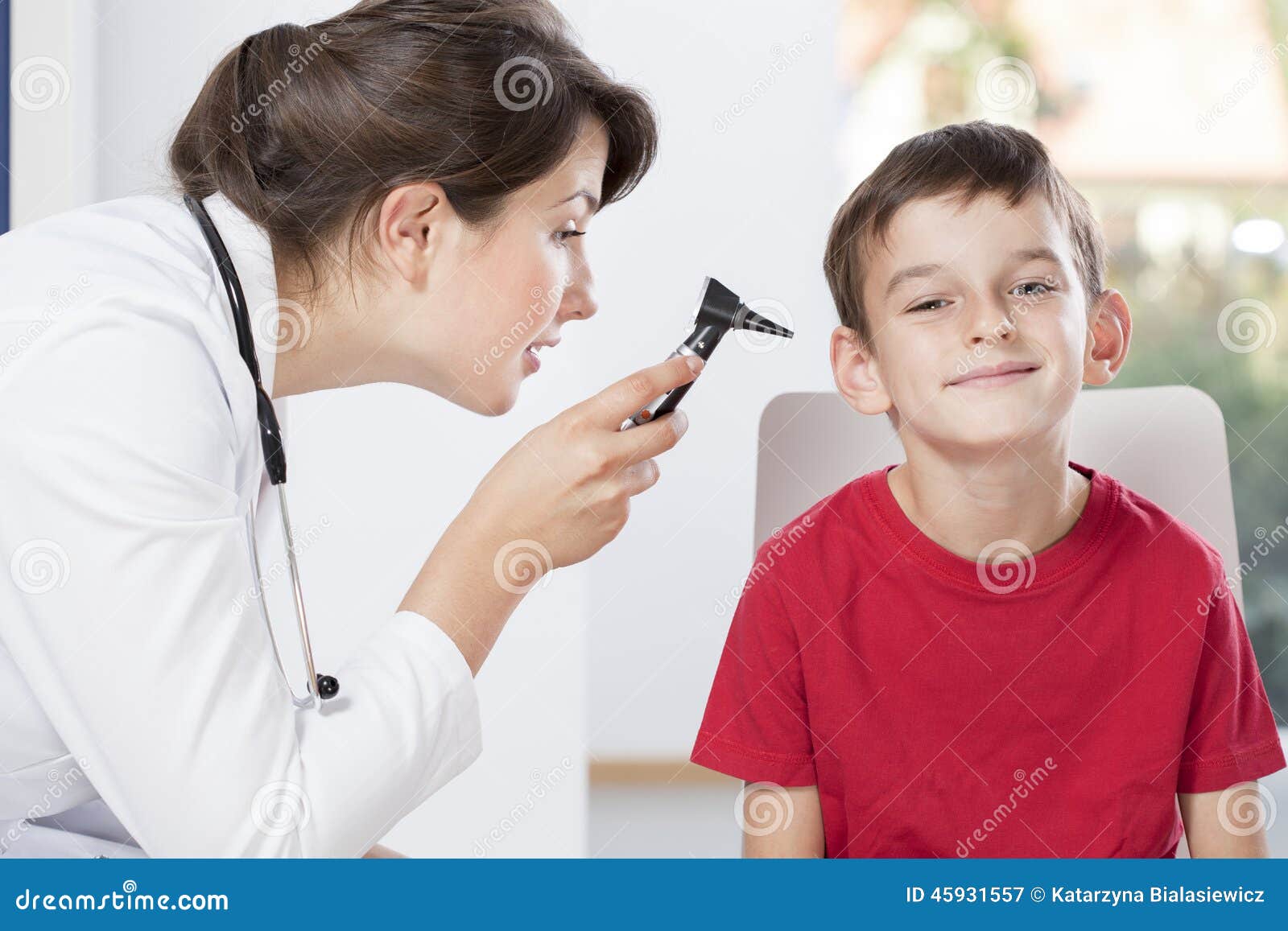 Female Pediatrician Using Otoscope Stock Image - Image of office, care ...