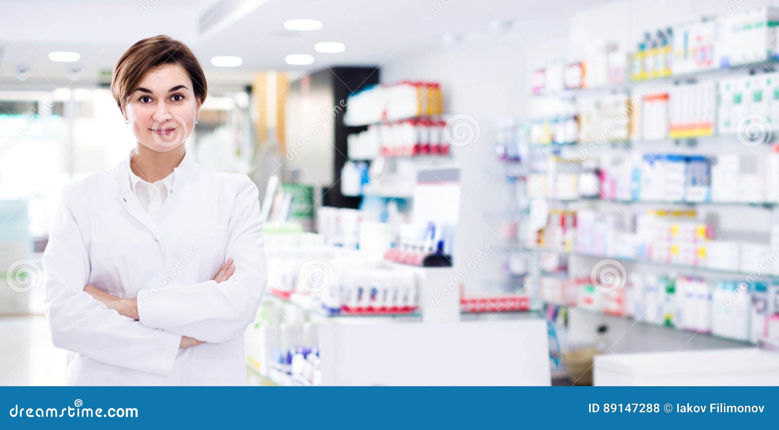 Female Pharmacist Demonstrating Assortment of Pharmacy Stock Photo ...