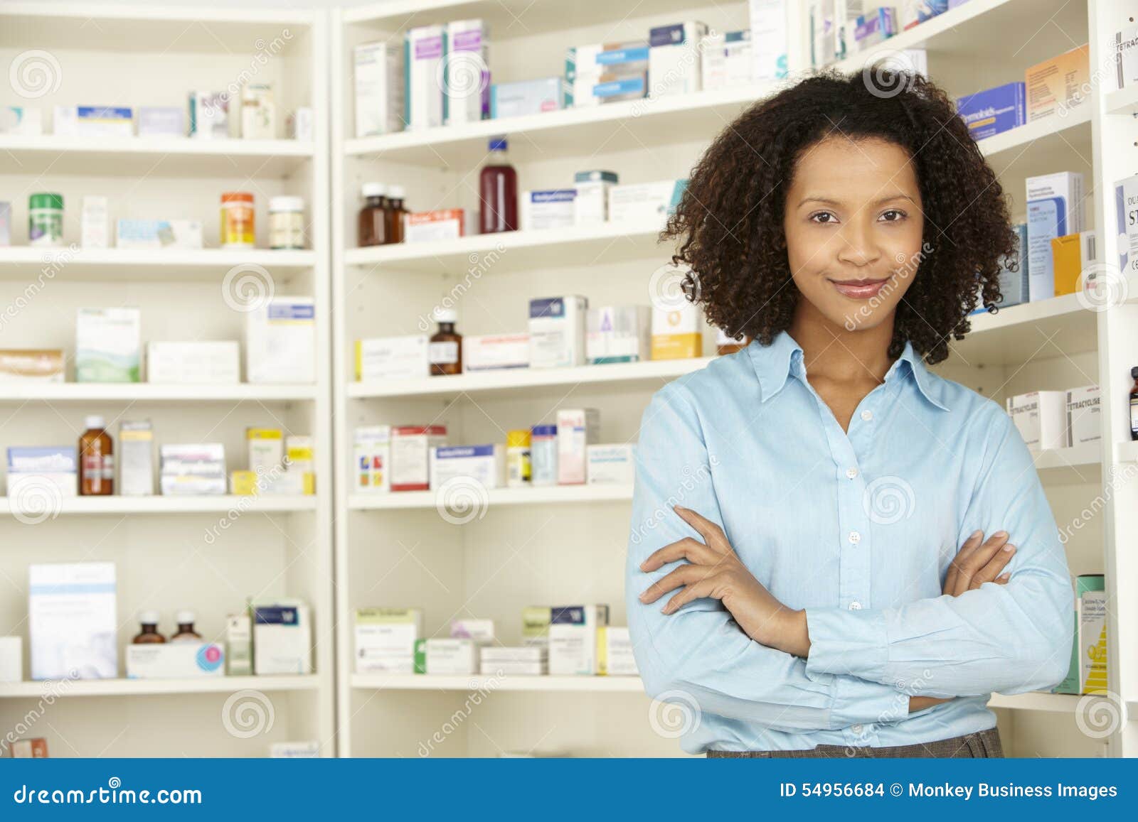Female Pharmacist Working in UK Pharmacy Stock Photo - Image of medical ...