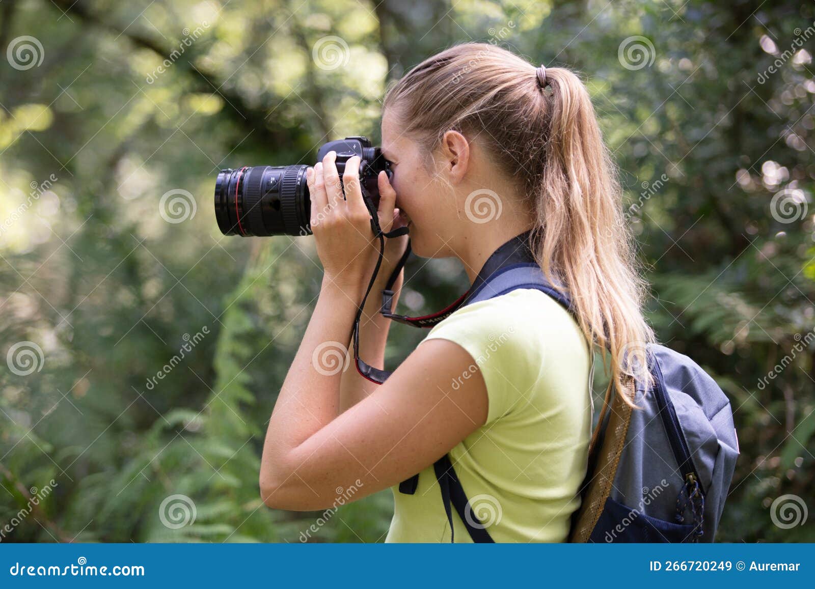Female Photographer Focusing Camera in Countryside Stock Image - Image ...