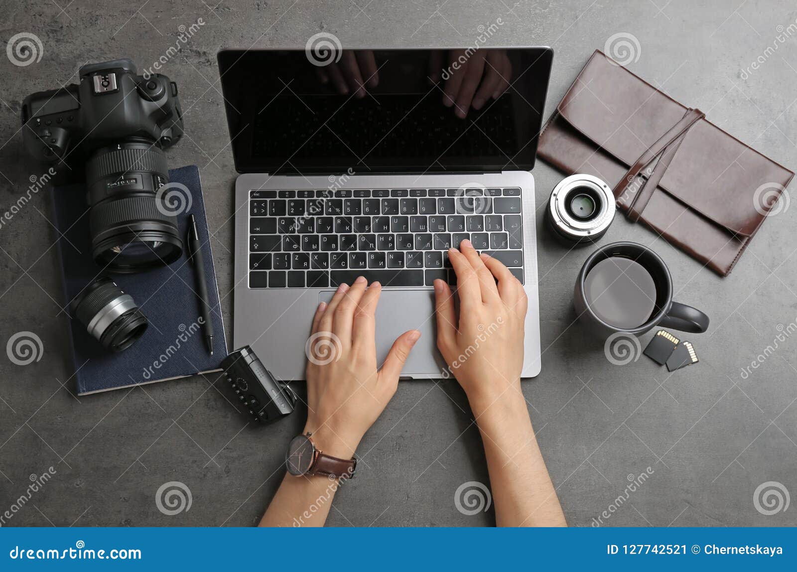 Female Photographer Using Laptop at Table Stock Image - Image of ...
