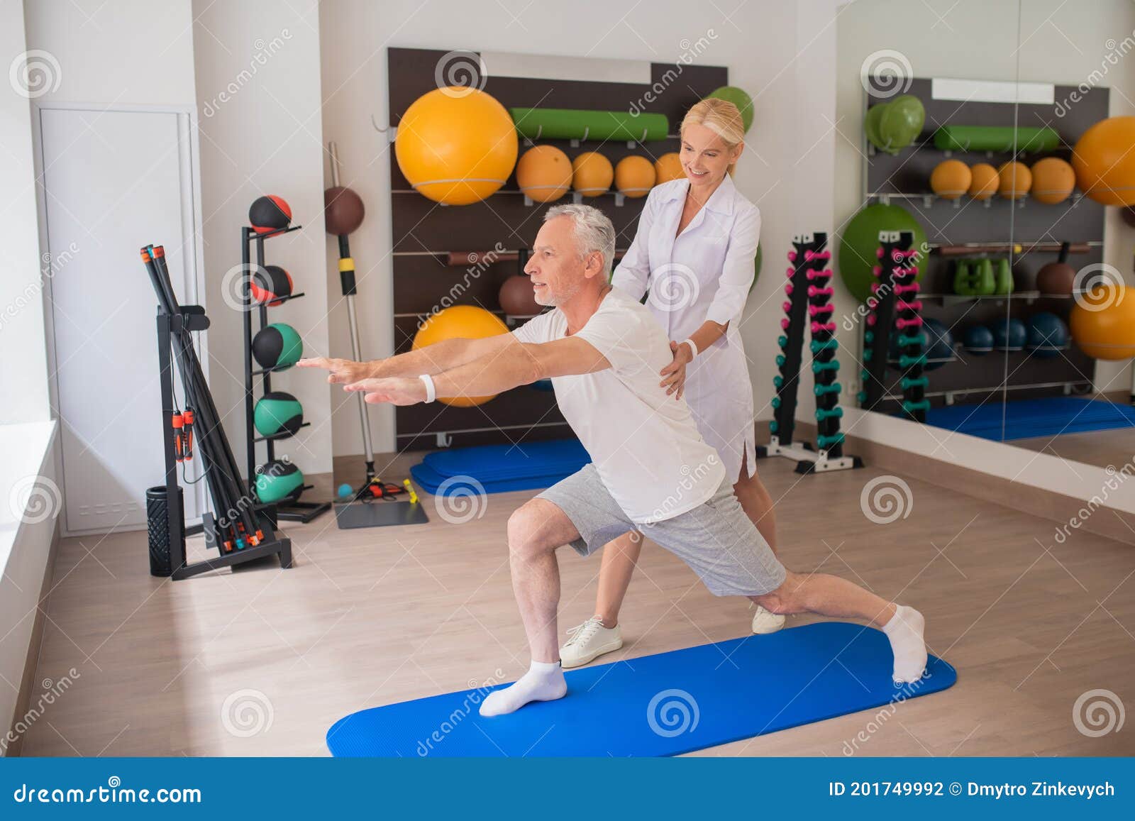 A Female Physical Therapist Working with a Patient Stock Photo - Image ... A Female Physical Therapist Working with a Patient Stock Photo - Image ...