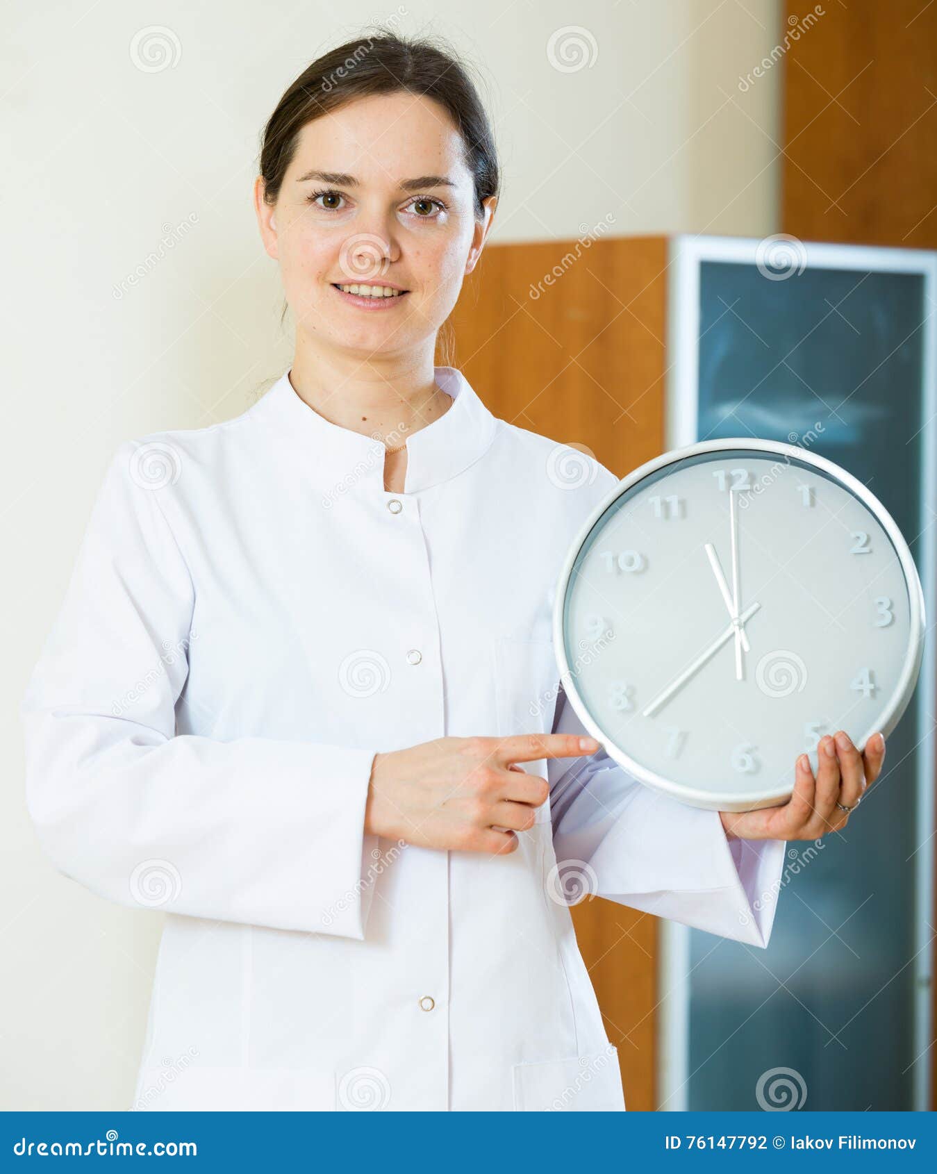 Female Physician Reminding about Time of Appointment Stock Photo ...
