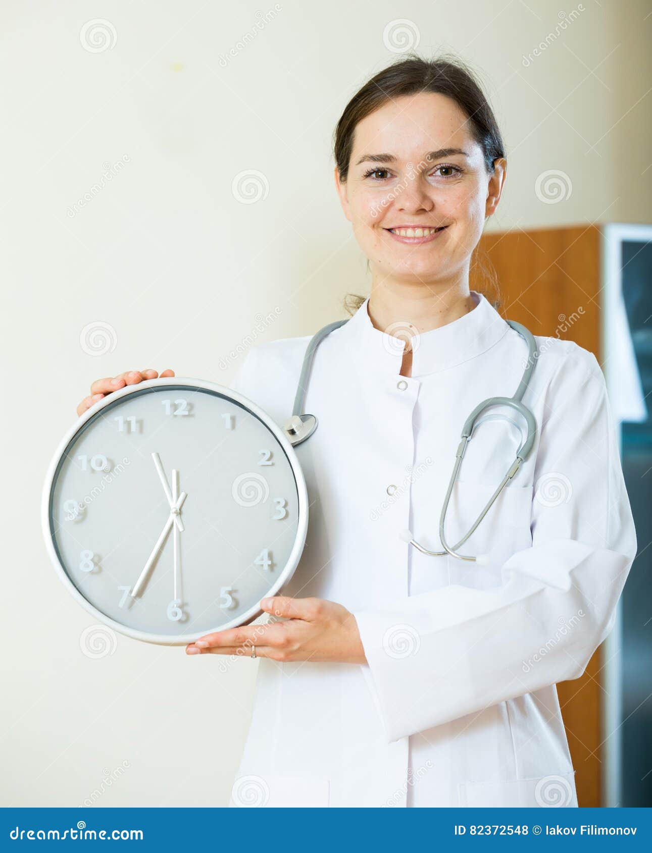 Female Physician Reminding about Time of Appointment Stock Photo ...