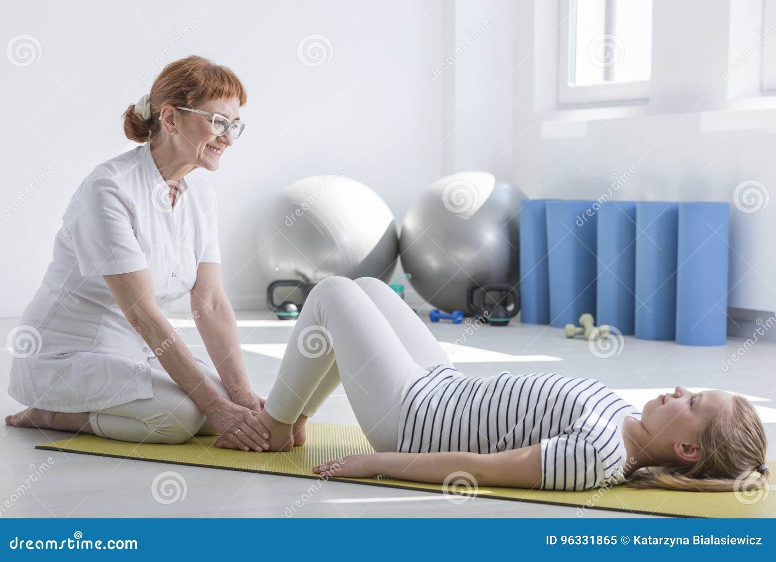 Female Physiotherapist Working with Child Stock Image - Image of ...
