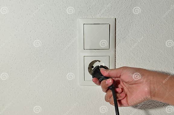 Female Plugging in Power Cord Stock Photo - Image of cable, industry ...