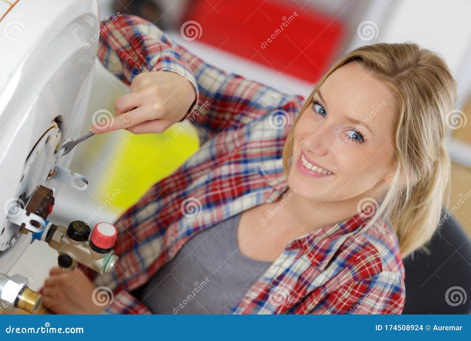 Female Plumber Working on Boiler Stock Photo - Image of horizontal ...