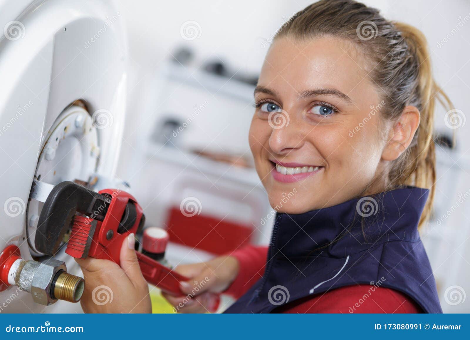 Female Plumber Working on Central Heating Boiler Stock Image - Image of ...