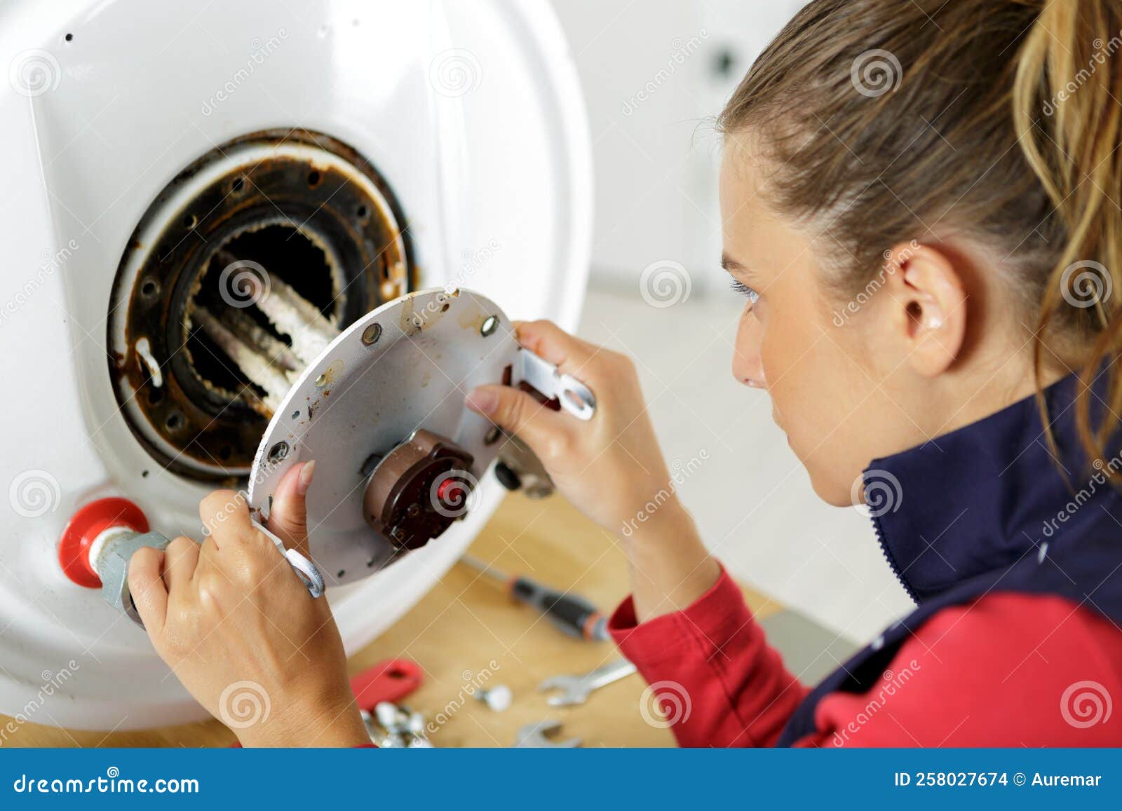 Female Plumber Working on Central Heating Boiler Stock Photo - Image of ...