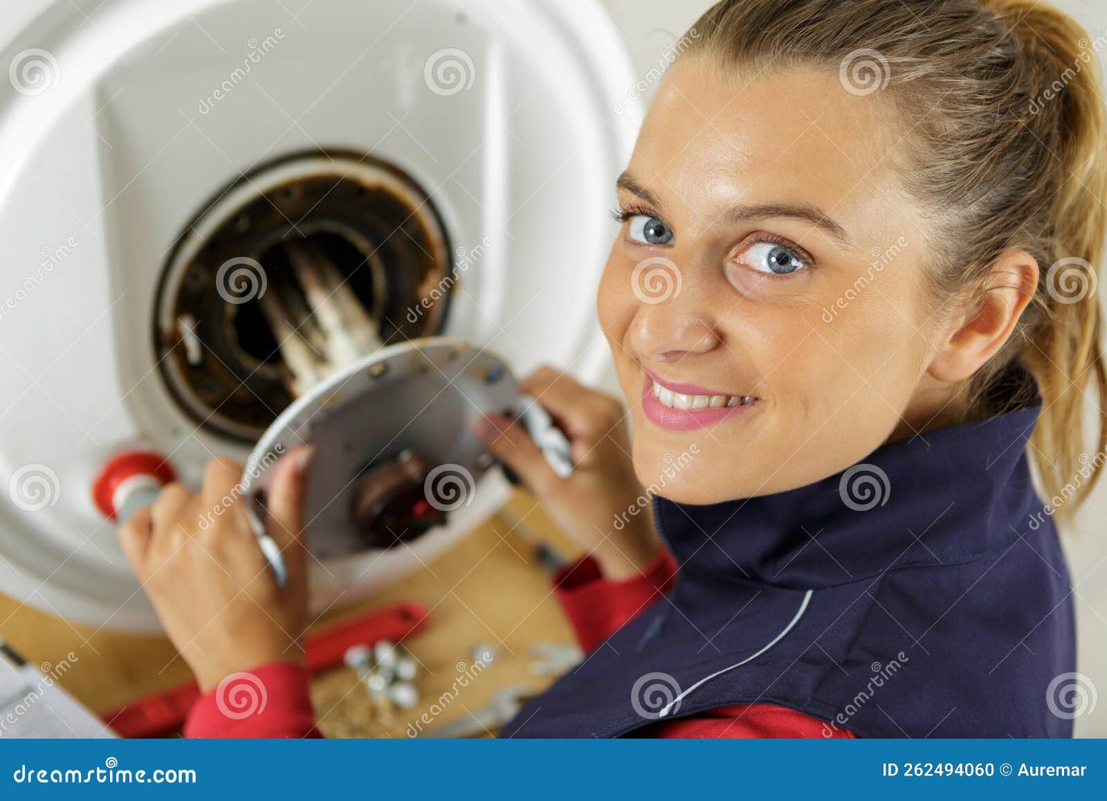 Female Plumber Working on Central Heating Boiler Stock Photo - Image of ...