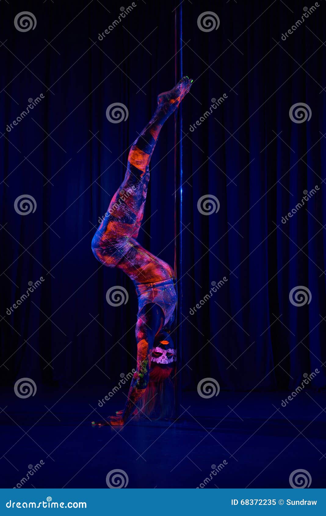 Female Pole Dancer in Bright Neon Colours Under Ultraviolet Stock Image ...