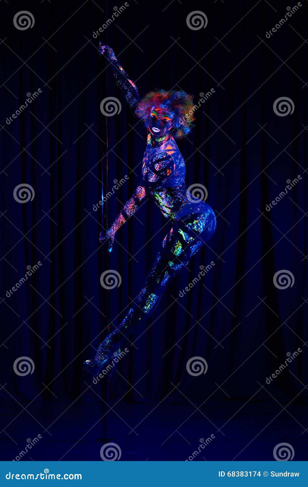 Female Pole Dancer in Bright Neon Colours Under Ultraviolet Stock Photo ...