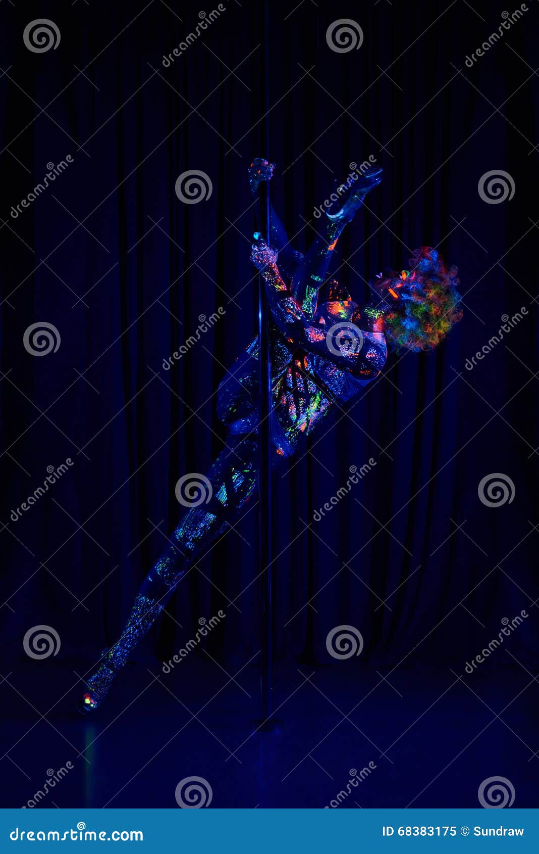 Female Pole Dancer in Bright Neon Colours Under Ultraviolet Stock Image ...