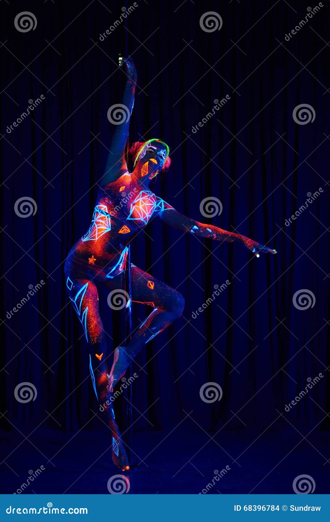 Female Pole Dancer in Bright Neon Colours Under Ultraviolet Stock Photo ...