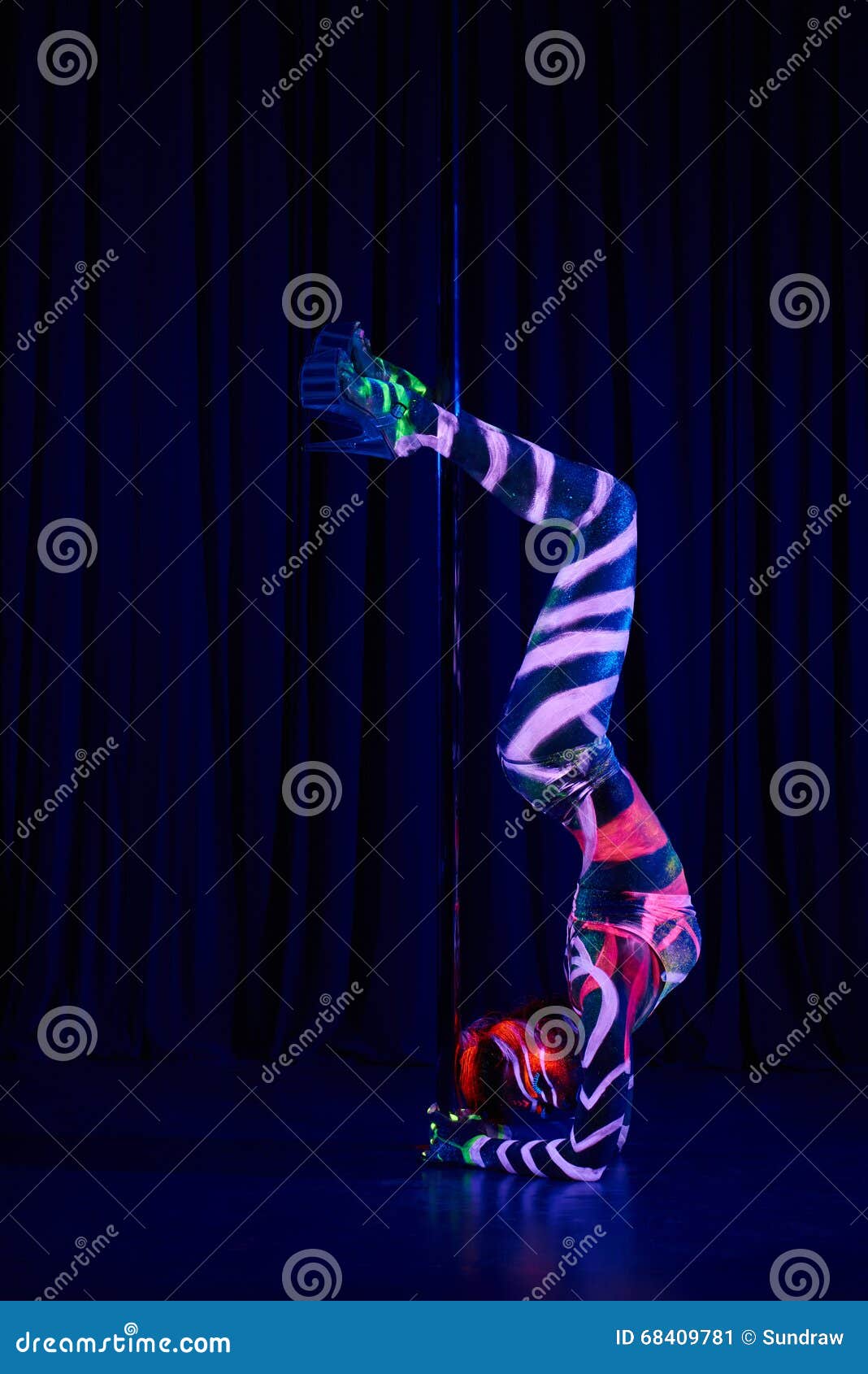 Female Pole Dancer in Bright Neon Colours Under Ultraviolet Stock Image ...