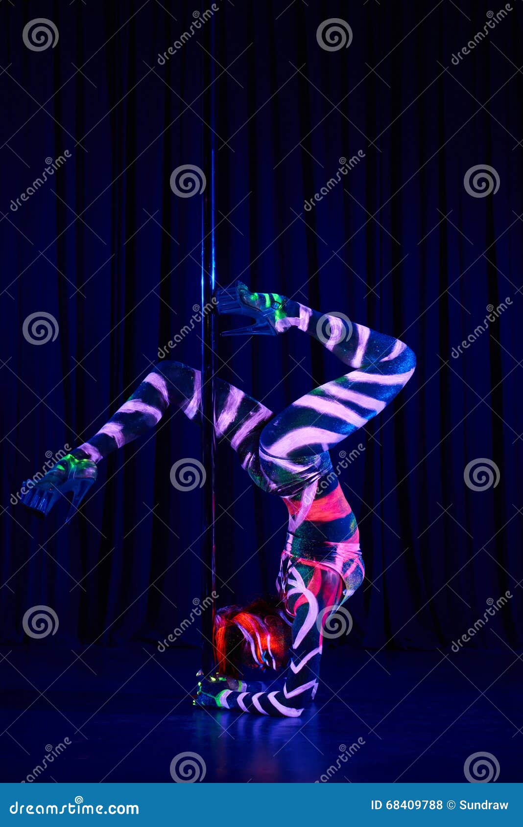 Female Pole Dancer in Bright Neon Colours Under Ultraviolet Stock Photo ...
