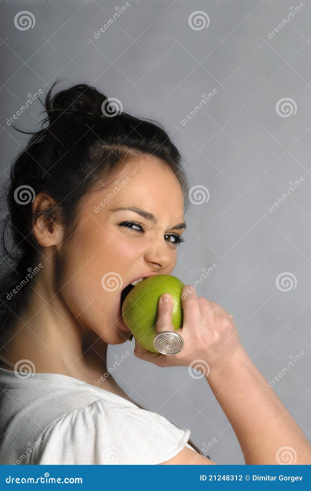 Trendy Young Brunette Woman Biting Apple Stock Photos - Free & Royalty ...
