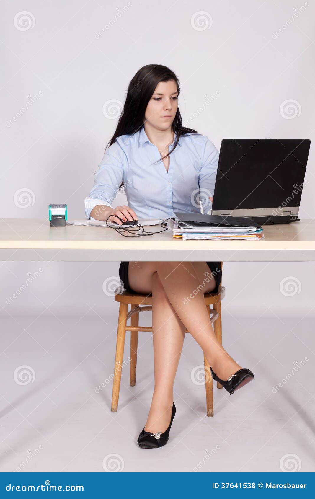 Female Poses Behind a Desk in the Office Stock Photo - Image of ...